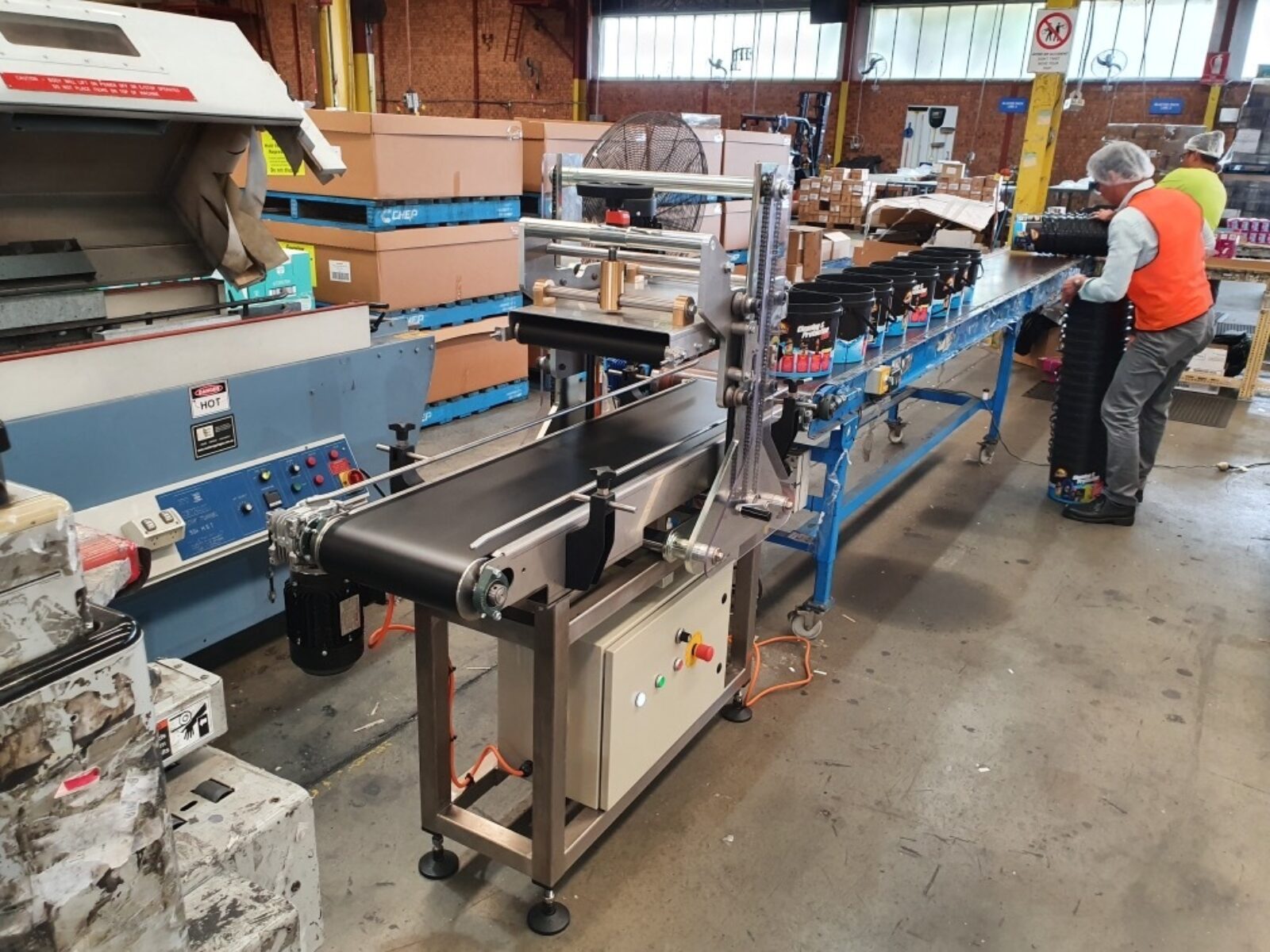 Conveyor Lid Press Machine - Lucan Engineering